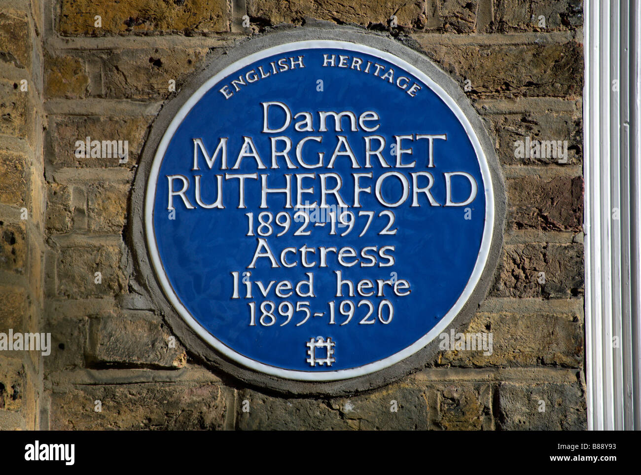 english heritage blue plaque marking a former home of actress dame ...