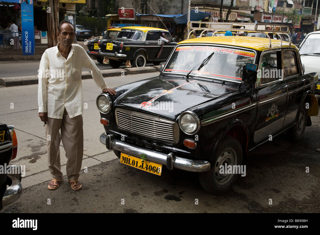 A cab driver in Mumbai with his Ambassador taxi. Mumbai, India Stock ...