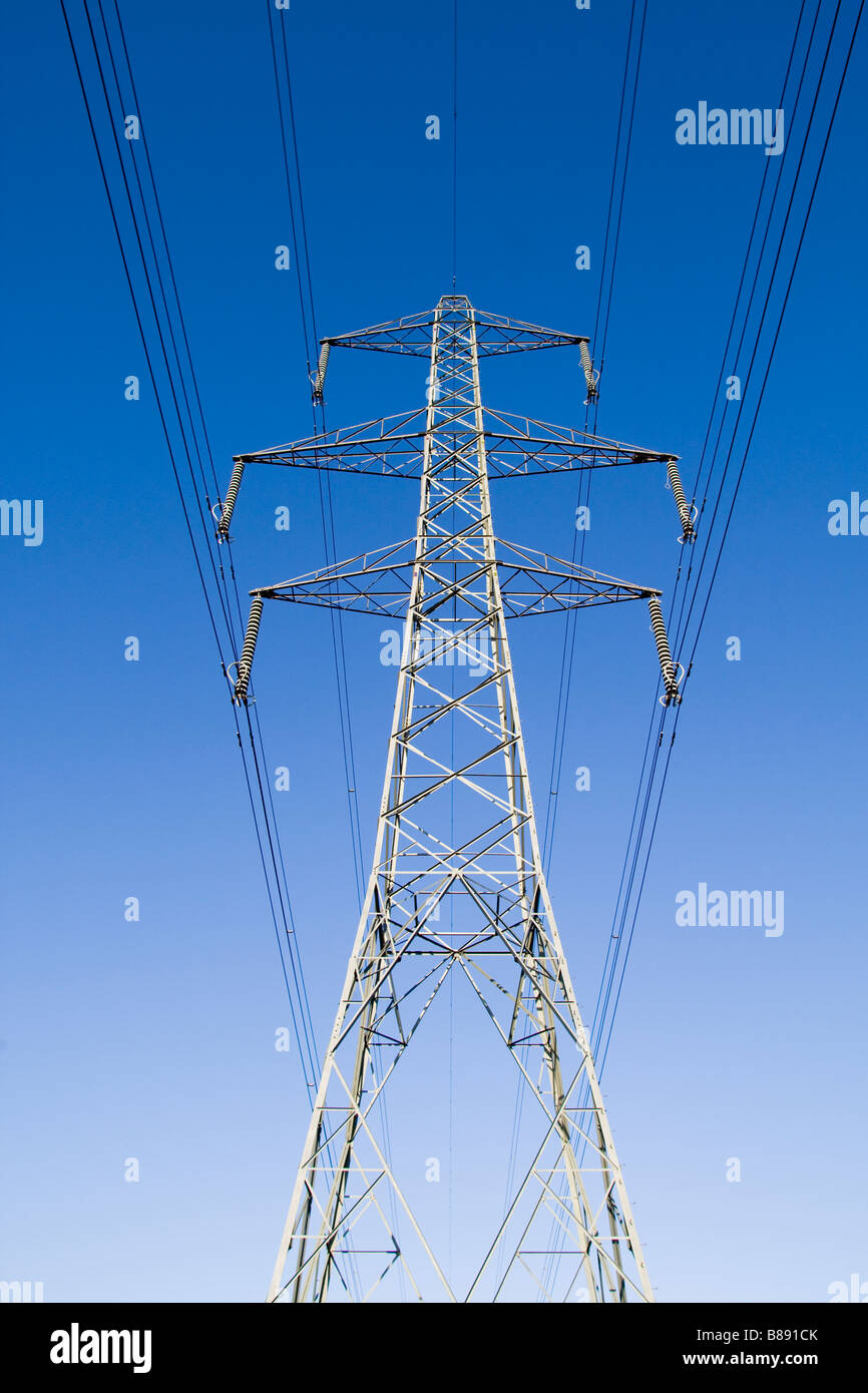 Electricity pylon with clear blue sky background Stock Photo - Alamy