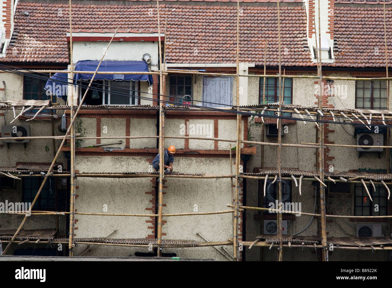 Traditional chinese construction work with bamboo scaffold, Shanghai ...