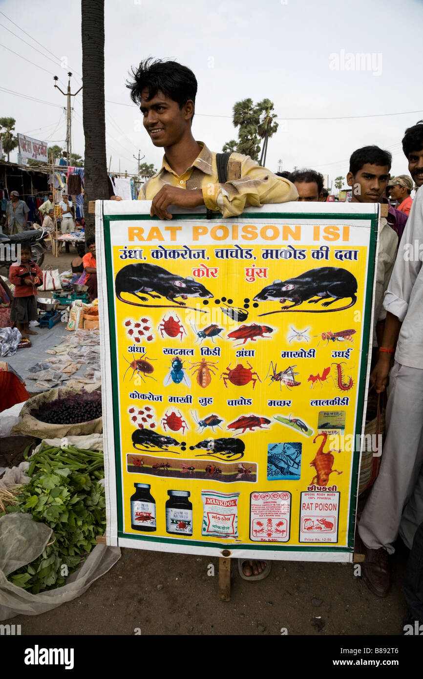 Rat poison seller at street market. Hazira, Surat, Gujarat. India Stock ...