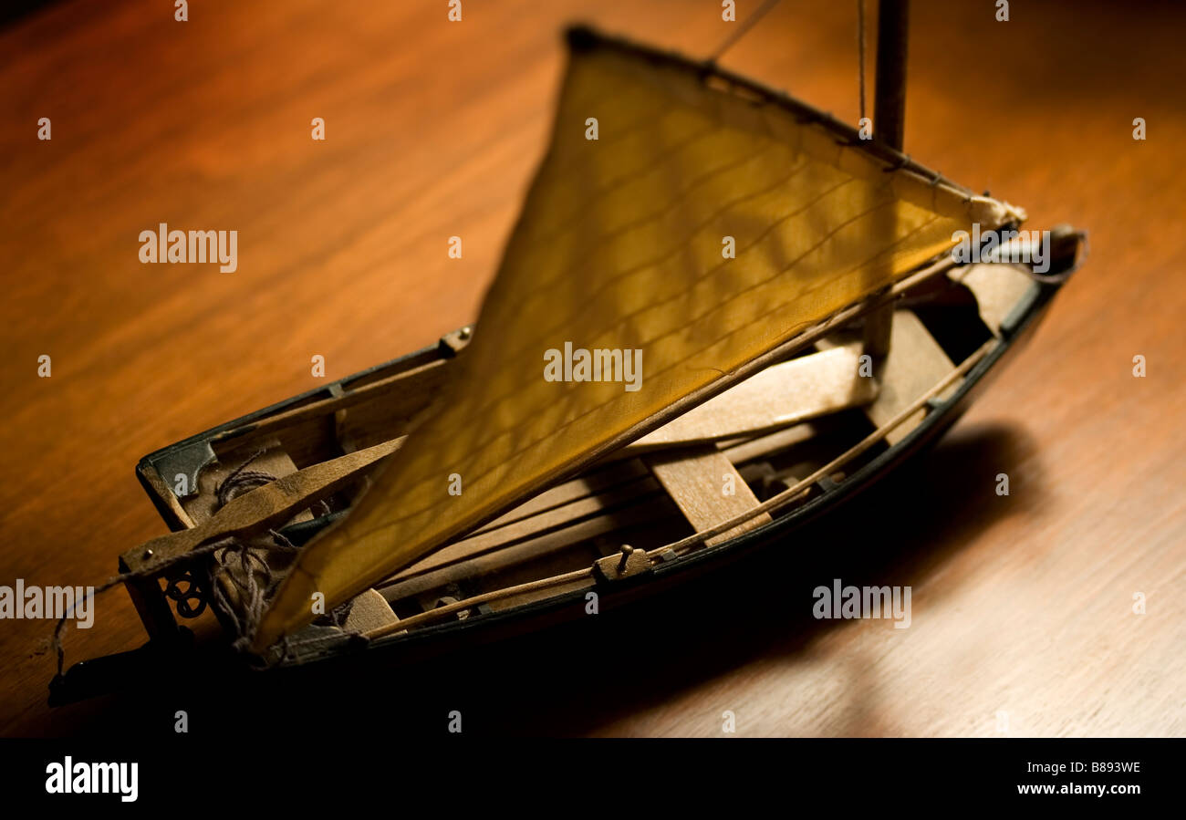 Wooden Model Boat, light source from one table lamp Stock Photo - Alamy