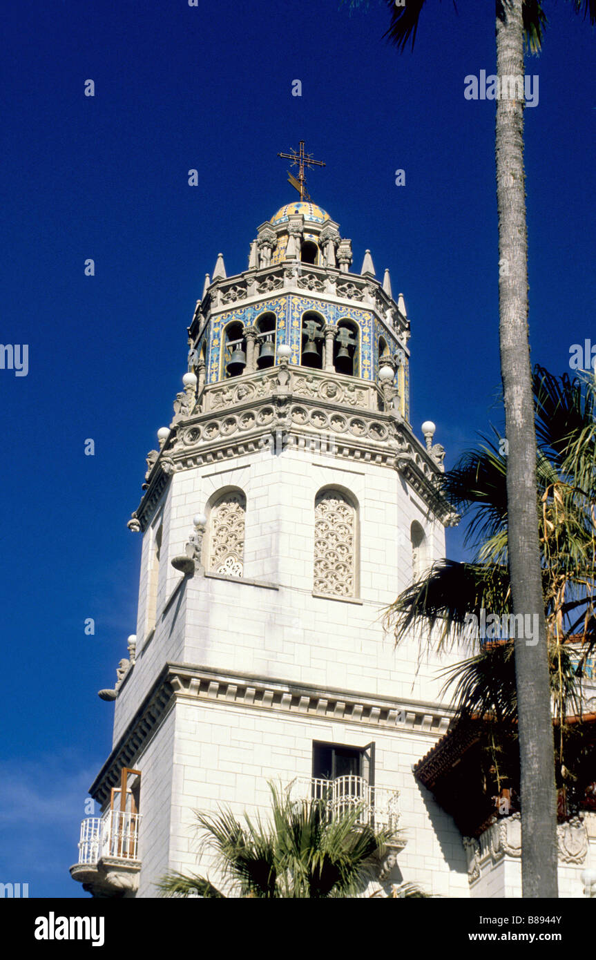 Church bell tower with palm trees and lamps Stock Photo - Alamy