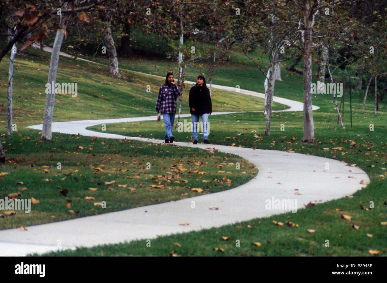 Curved sidewalk through grass hi-res stock photography and images - Alamy
