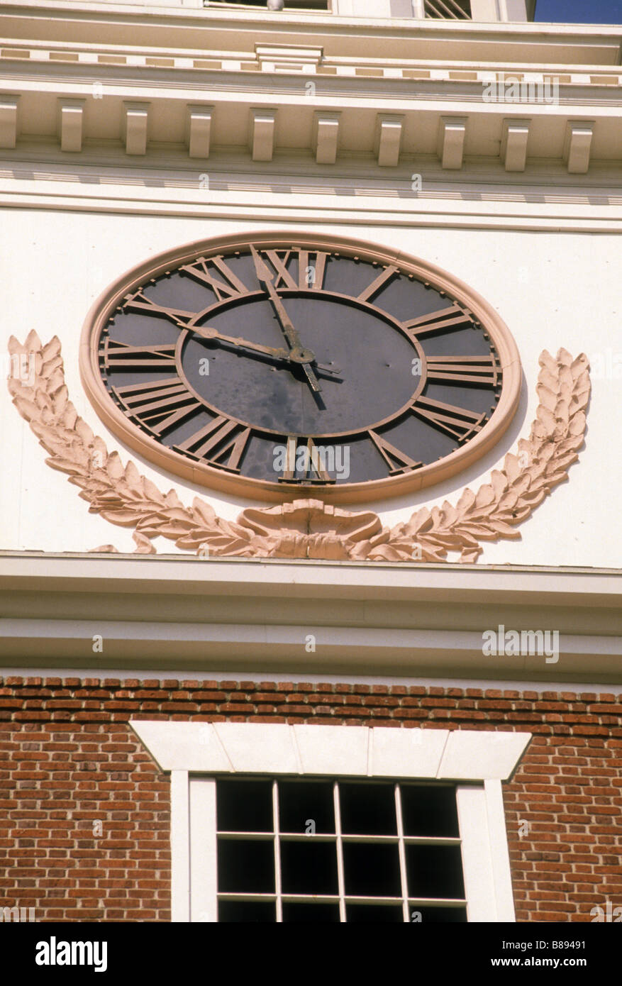 Large wall clock on front of government building time count hours ...