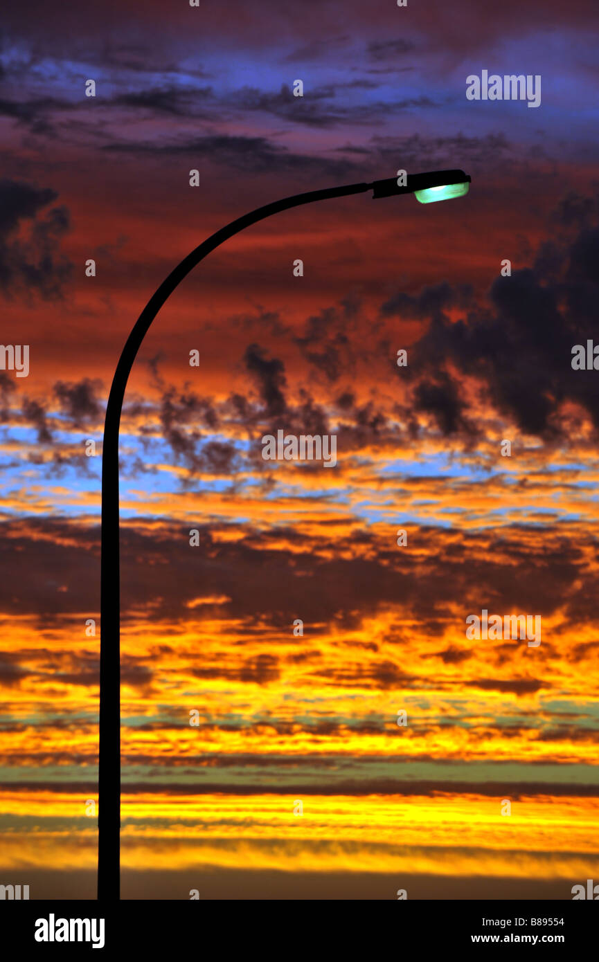 A single street light at sunset Stock Photo - Alamy