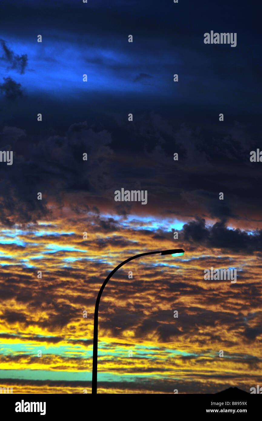 A single street light at sunset Stock Photo - Alamy