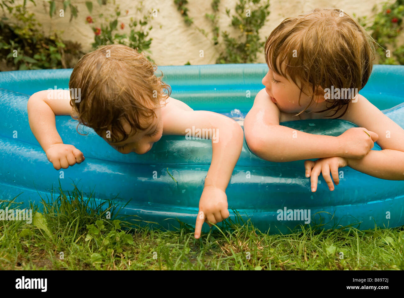 Children paddling shallow water hi-res stock photography and images - Alamy
