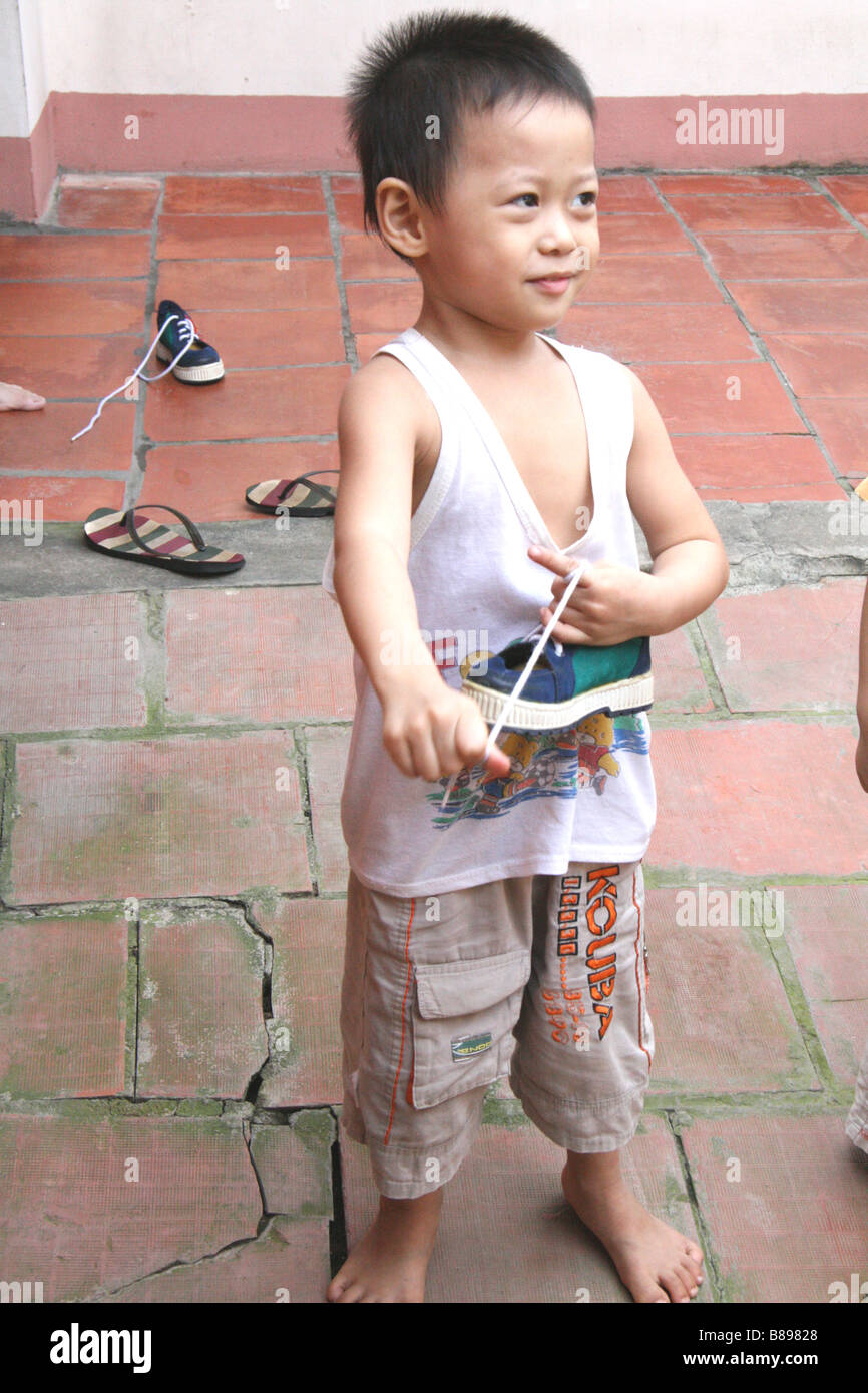Photograph of a cute Vietnamese boy taken in the Mekong Delta of ...