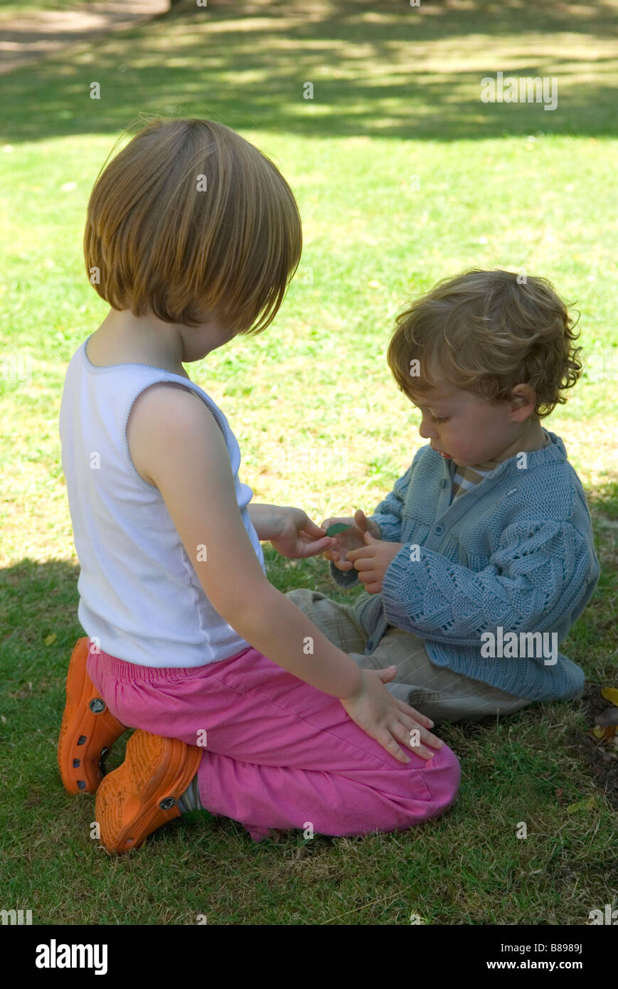 Older sister helping younger brother hi-res stock photography and ...