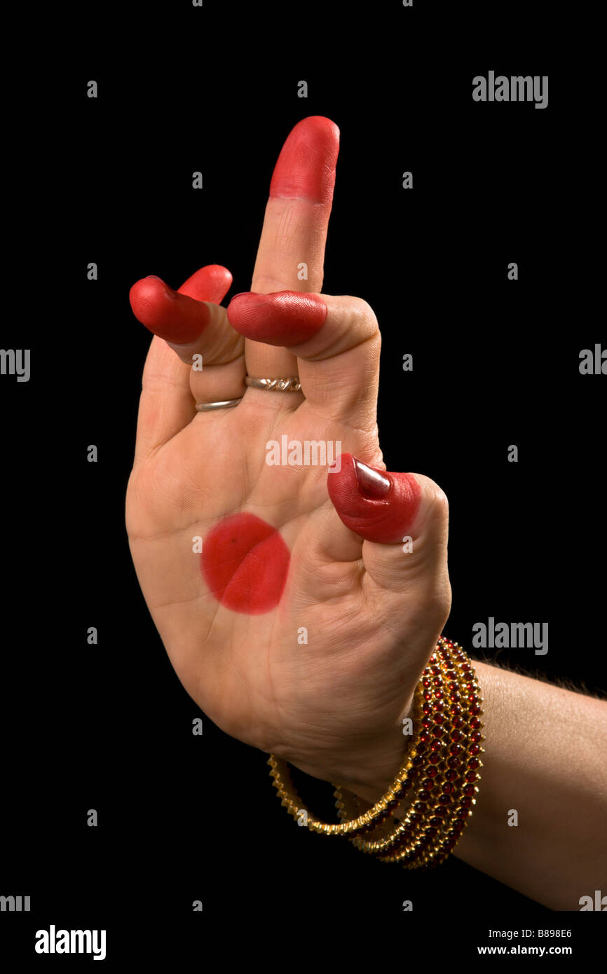 Woman hand showing Schukatunda hasta (meaning Parrot's head) of indian ...