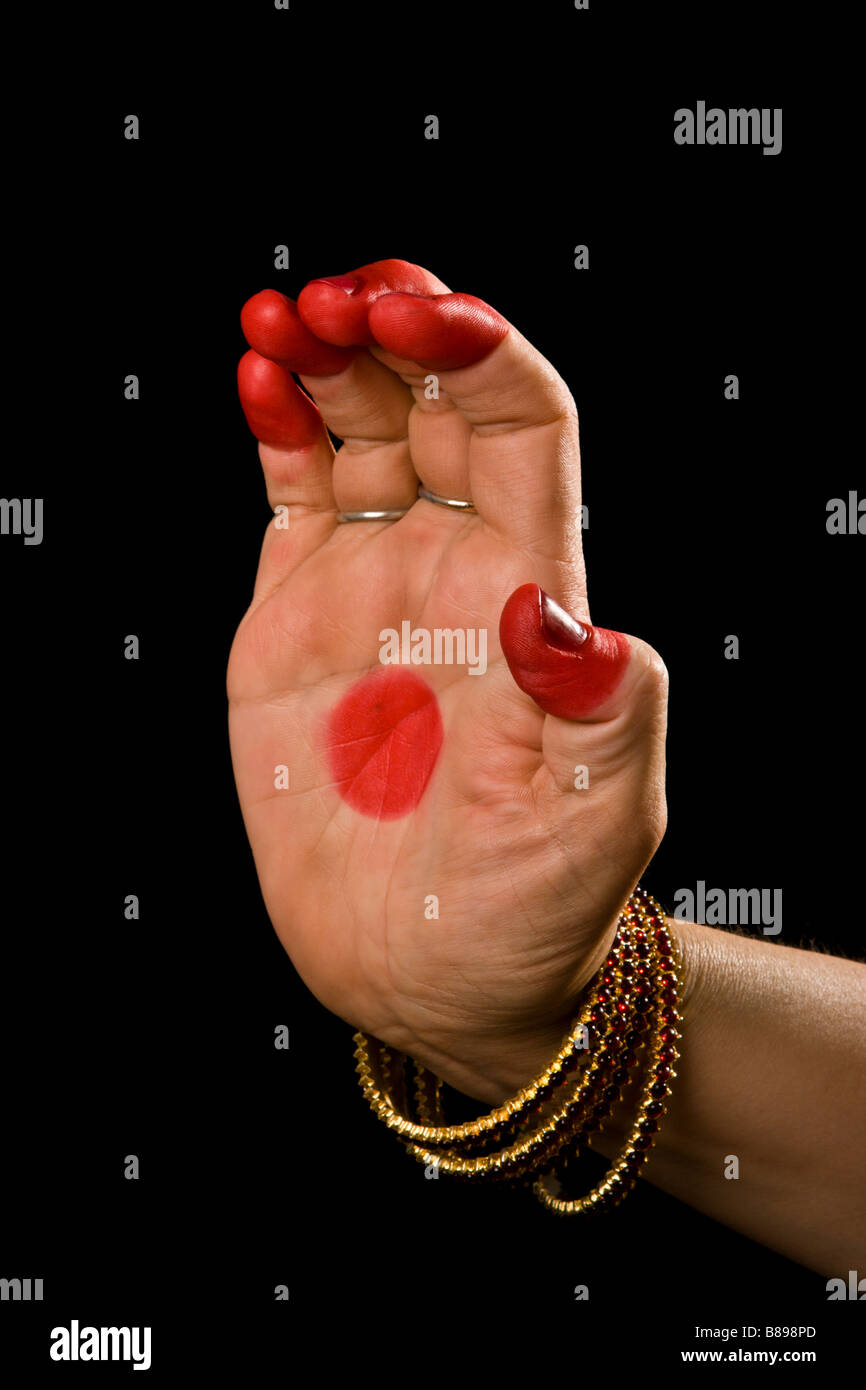 Woman hand showing Sarpashira hasta (meaning Snake hood) of indian ...