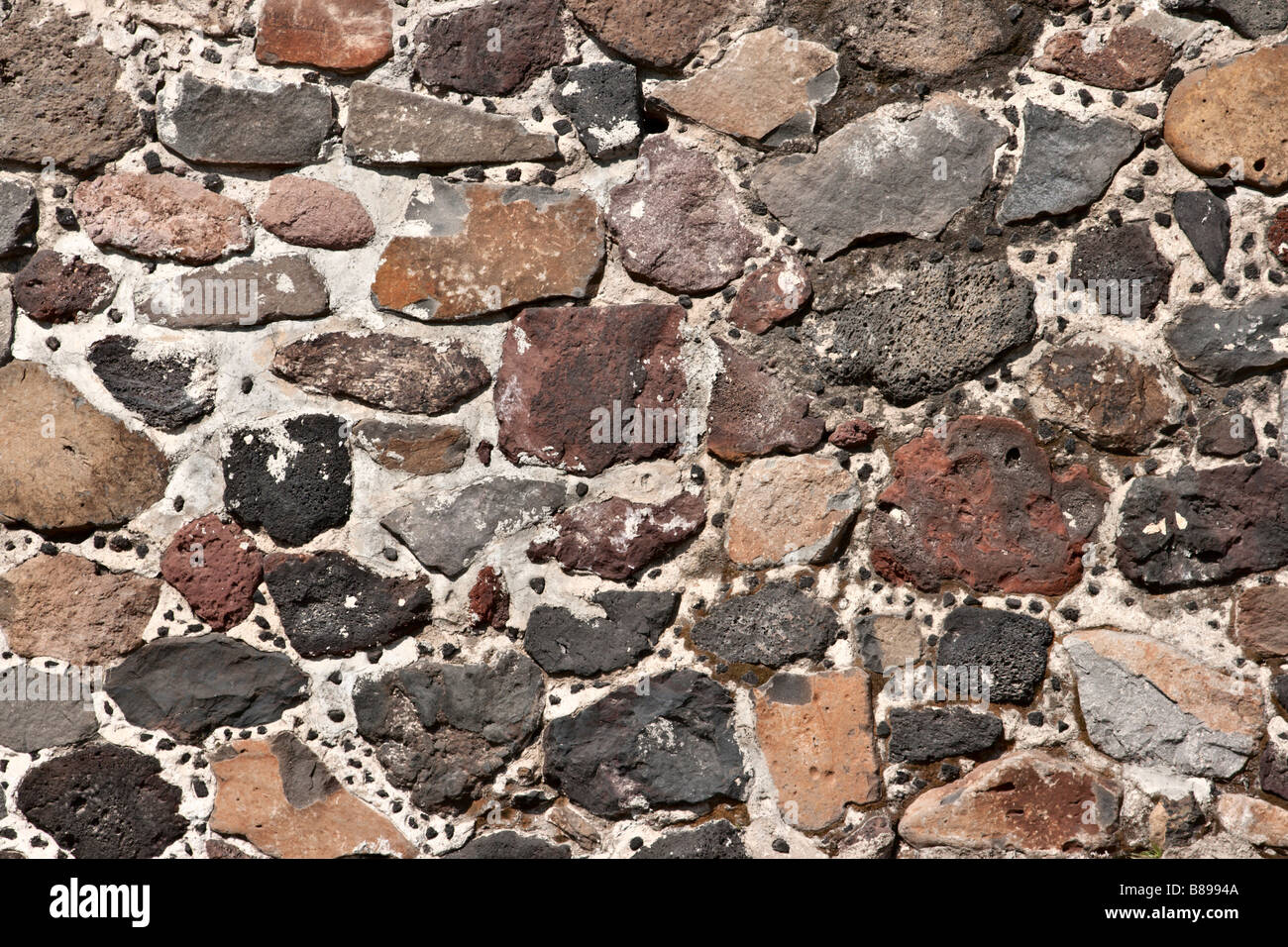 Texture of stone wall of ancient Mayan ruins in Mexico Stock Photo - Alamy