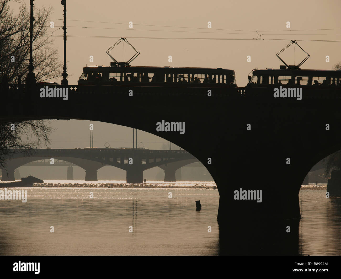 Trams going over a bridge on the River Vltava, Prague Stock Photo - Alamy