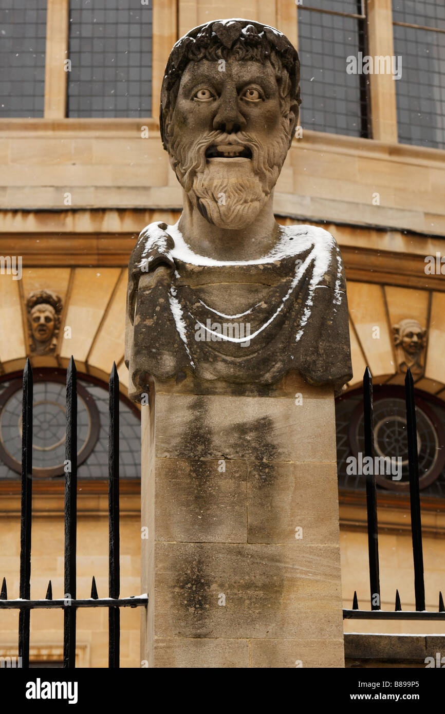 Snow covered [Emperor's head] statue outside "Sheldonian Theatre ...
