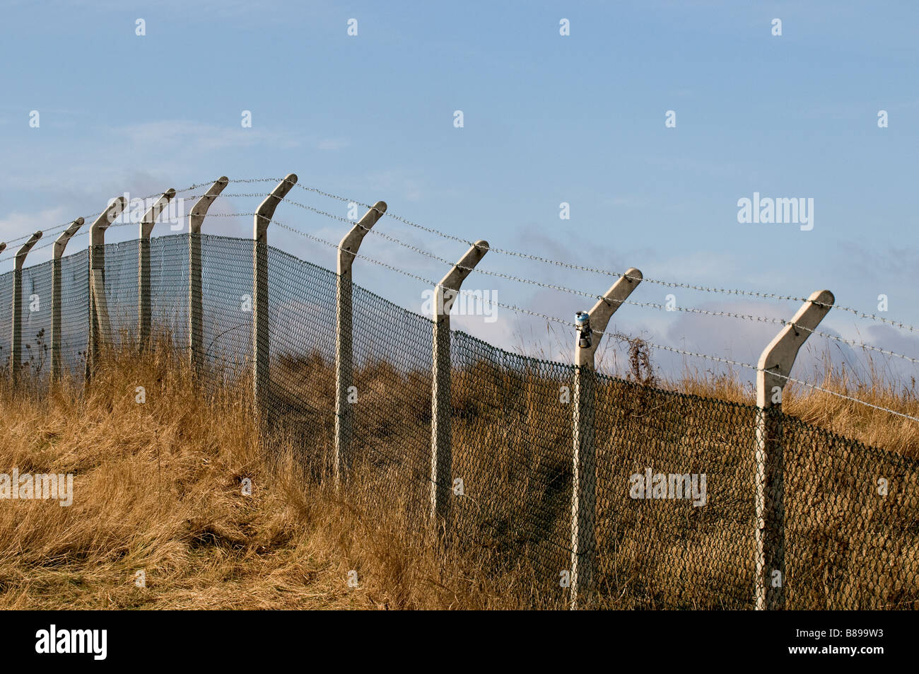 A security fence Stock Photo - Alamy