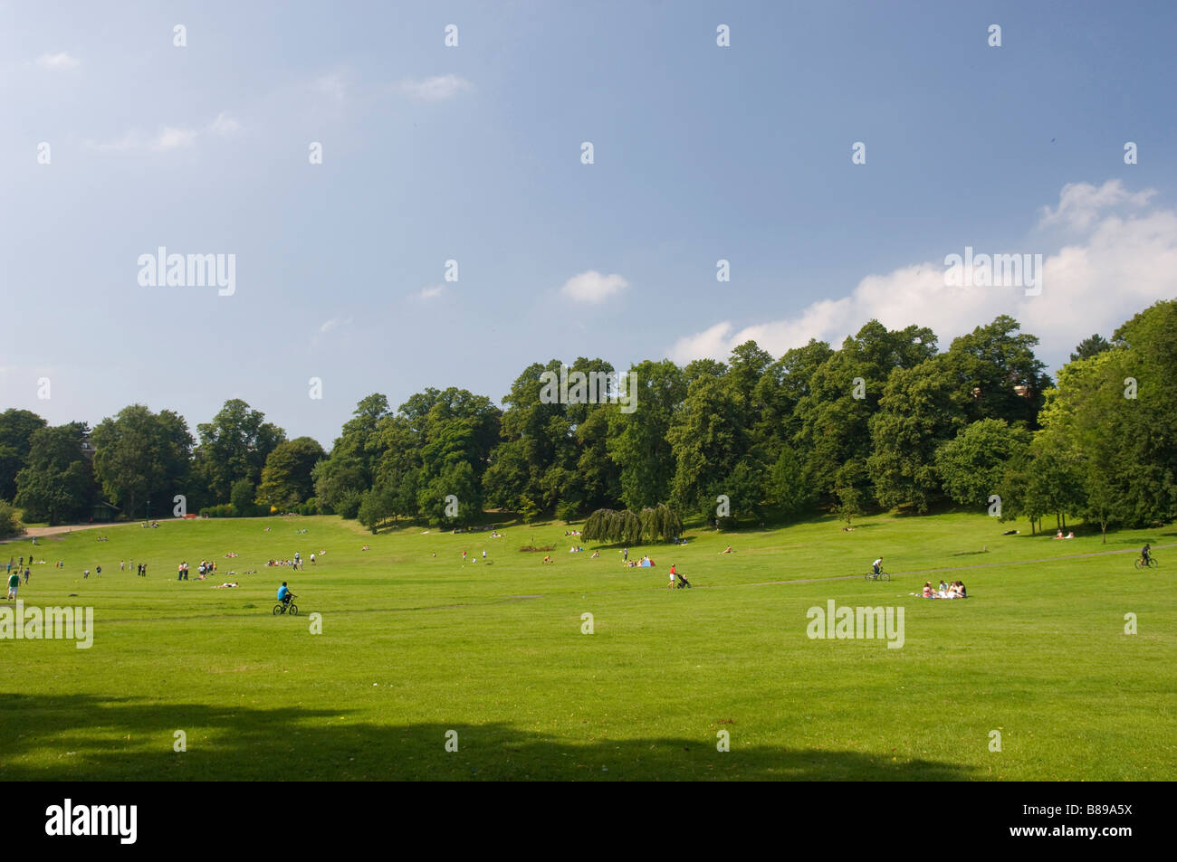 People enjoying a summers day in Avenham Park Preston Lancashire United ...
