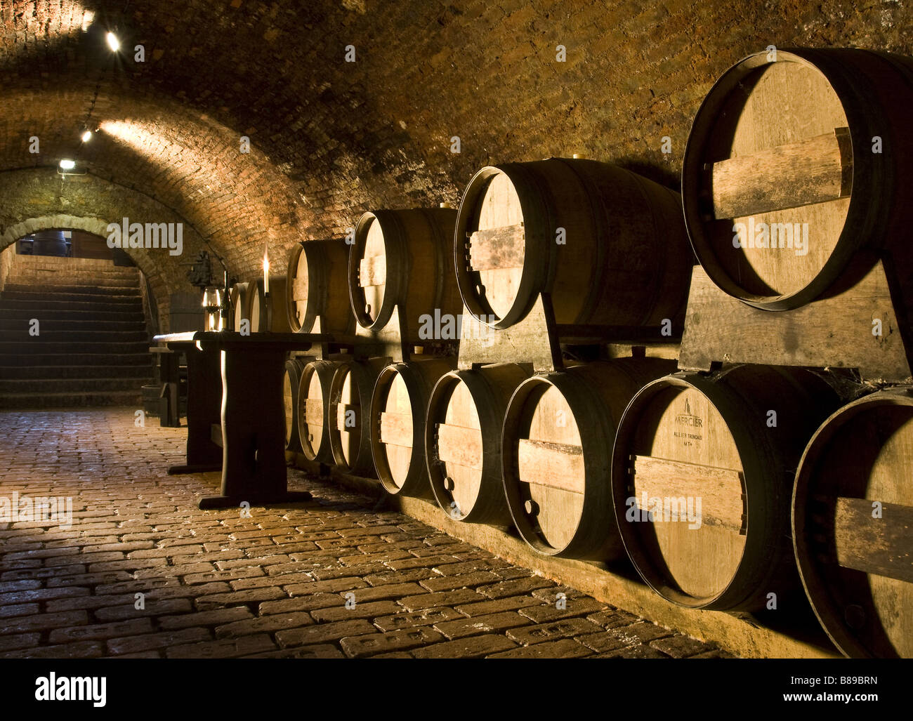 wine casks in wine cellar Stock Photo - Alamy