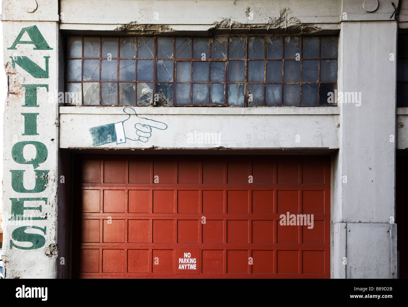 Antiques sign on old warehouse building in The Strip District ...