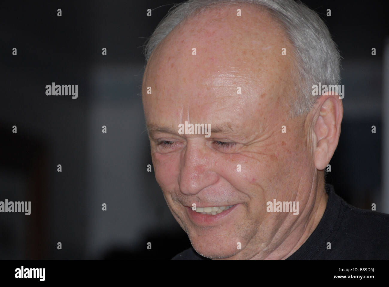 A 60 year-old man smiles and laughs Stock Photo - Alamy