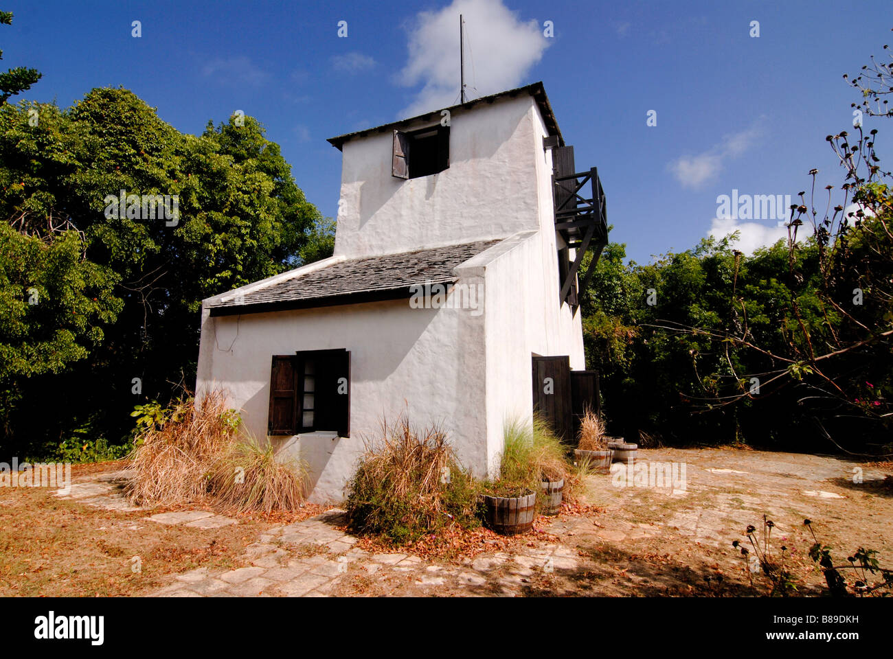 A small separated lighthouse with a little balcony at Barbados ...
