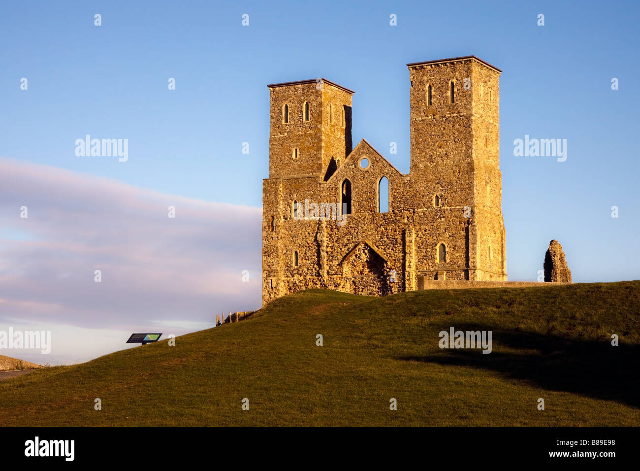 Remains of Reculver church towers bathed in late afternoon sun in ...