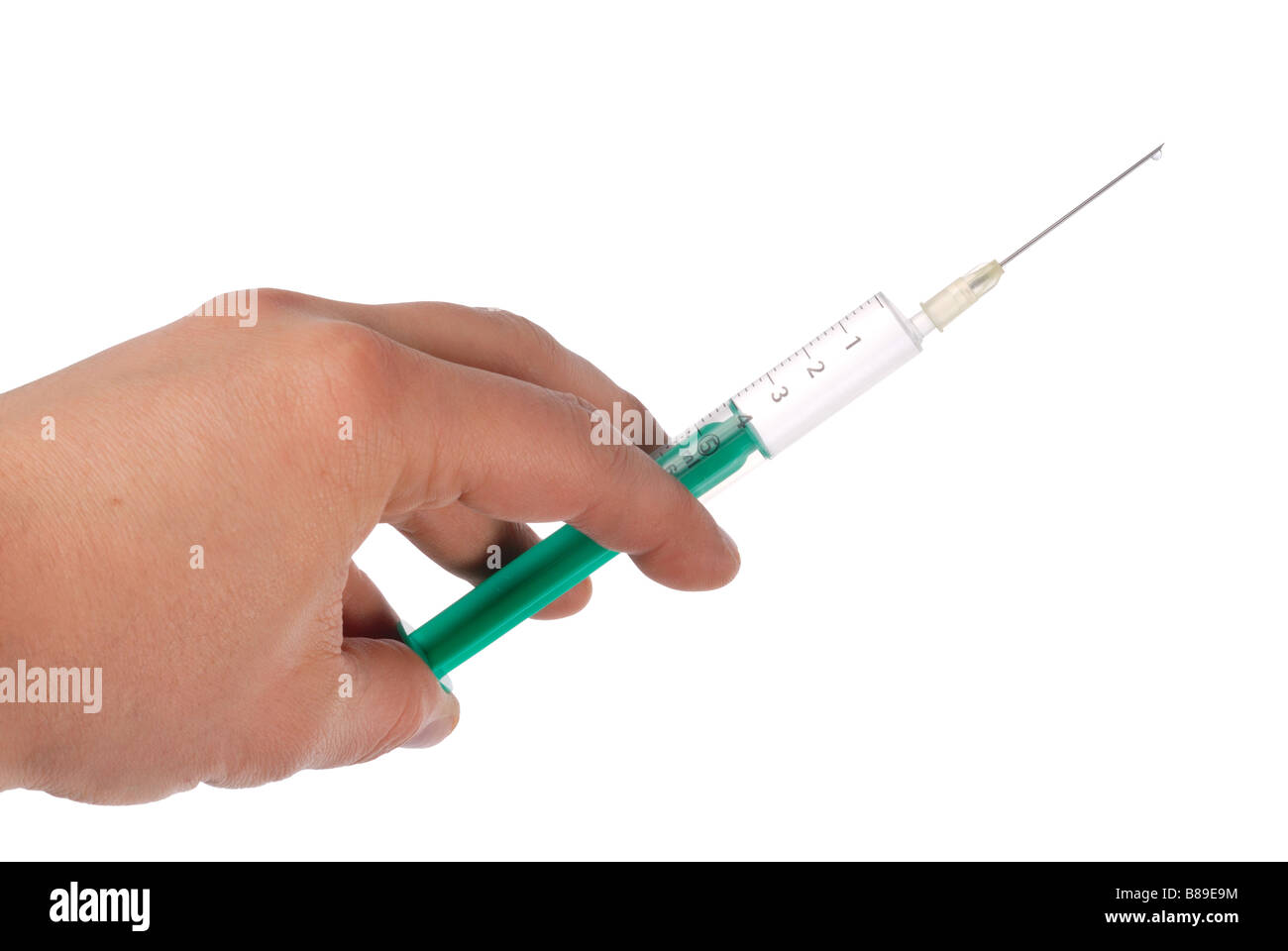 Hand and Syringe Stock Photo - Alamy