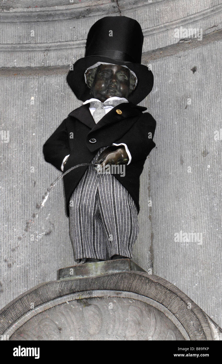 Manneken Pis statue dressed in top hat and tails, Brussels Stock Photo ...