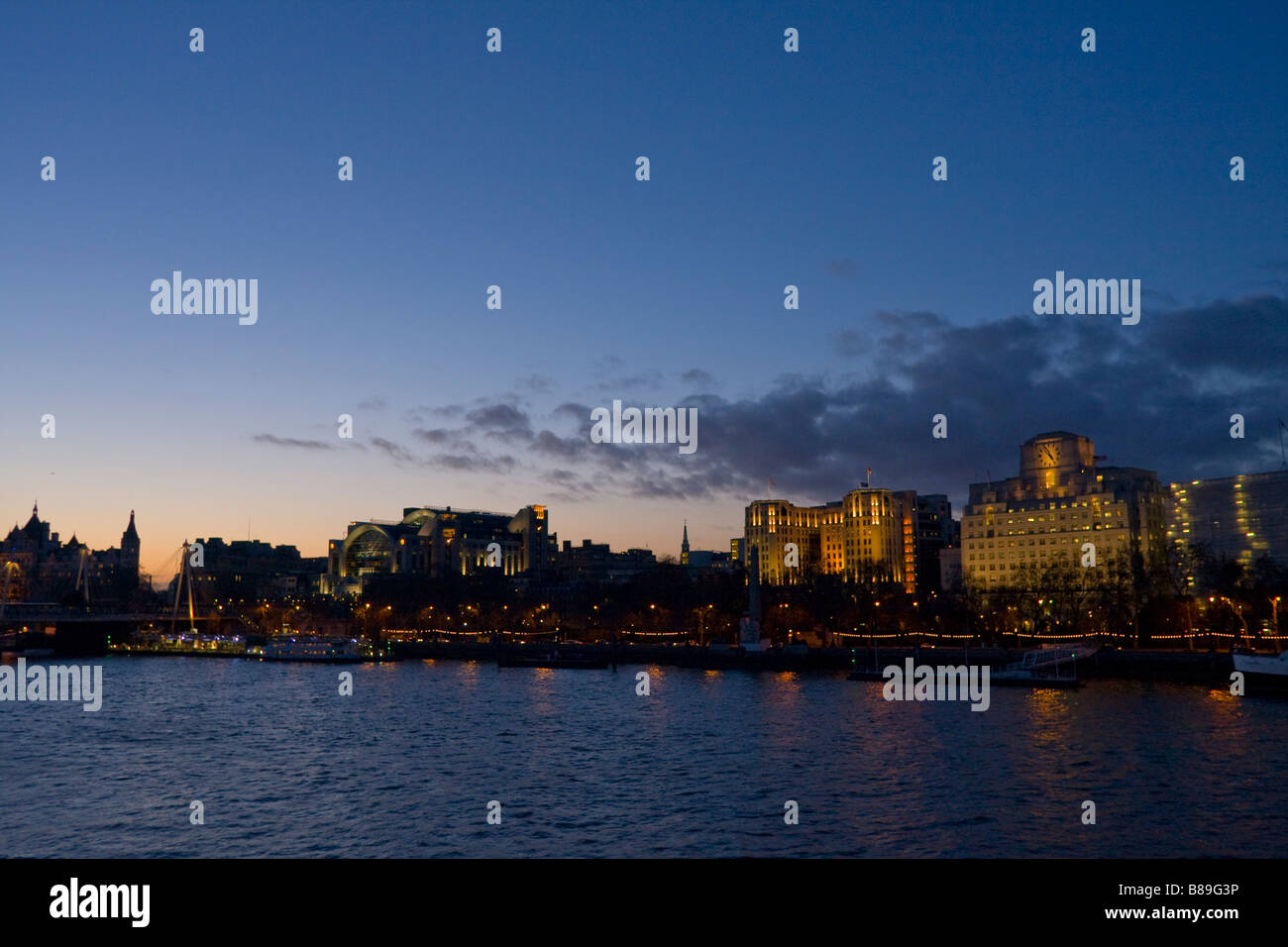 London Skyline twilight. blue clouds night fall. golden buildings River ...