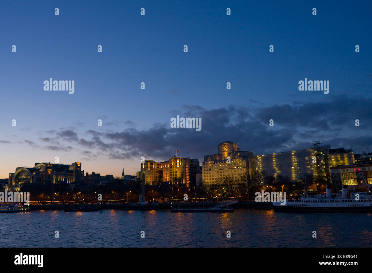 London Skyline twilight. blue clouds night fall. golden buildings River ...