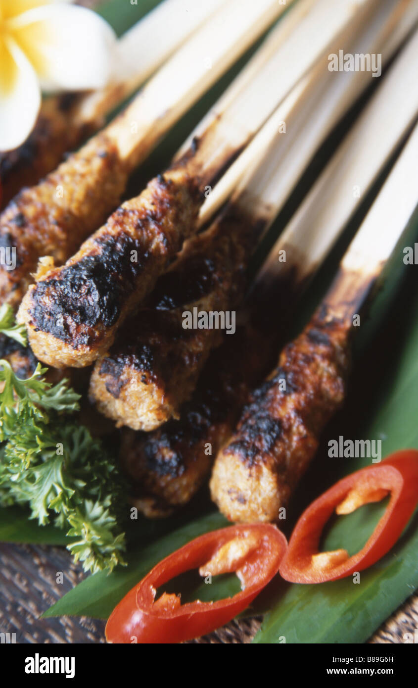 Sate lilit grilled meat on bamboo skewer Balinese style Stock Photo - Alamy
