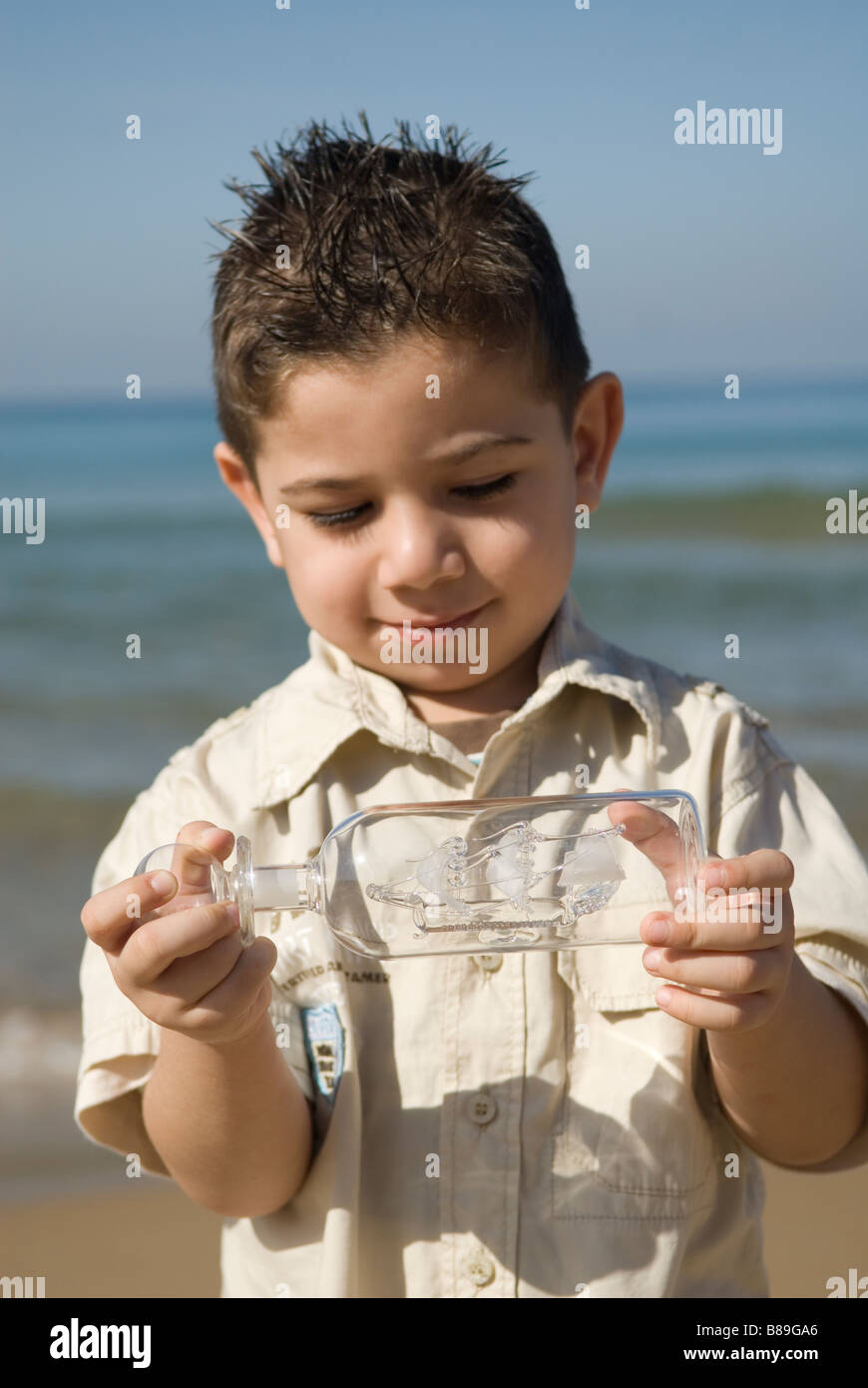 Young boy model ship hi-res stock photography and images - Alamy
