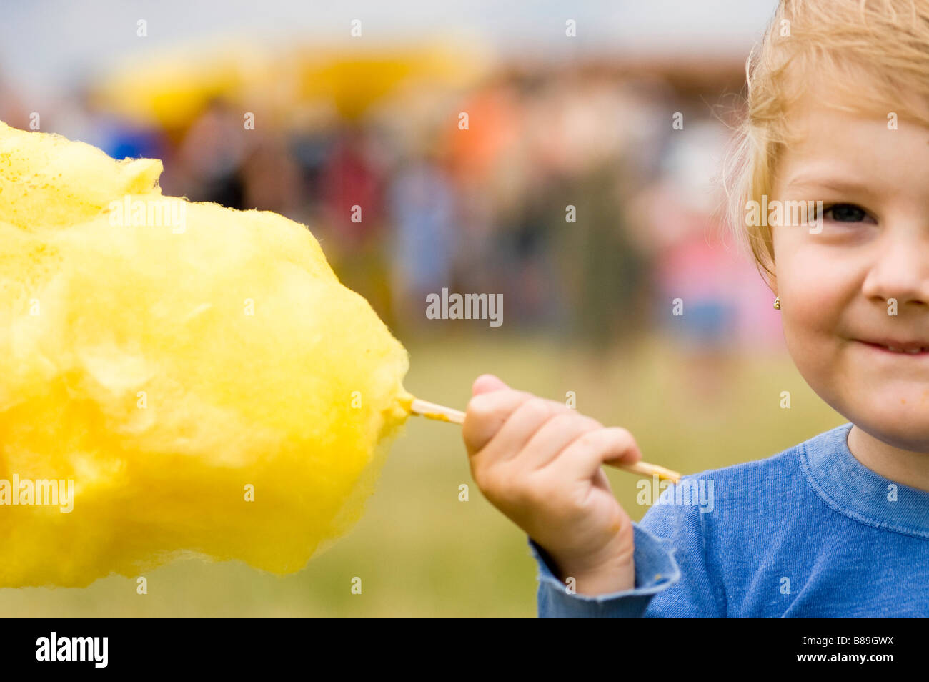 little girl with candy floss Stock Photo - Alamy