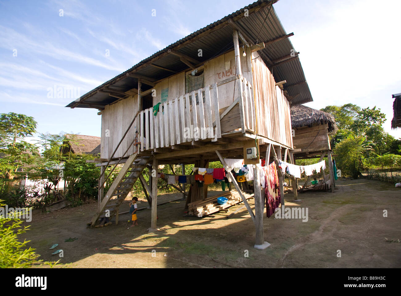 wooden house / hut on stilts in Amazonian village Ecuador South America ...