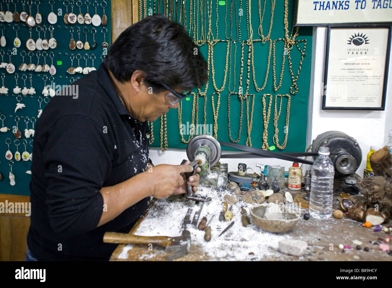 Artist work carving turning Tagua seed (Phytelephas Macrocarpa) Ivory ...