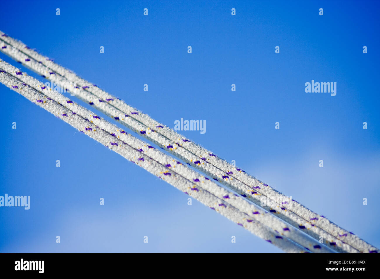 Rope in blue sky Stock Photo - Alamy