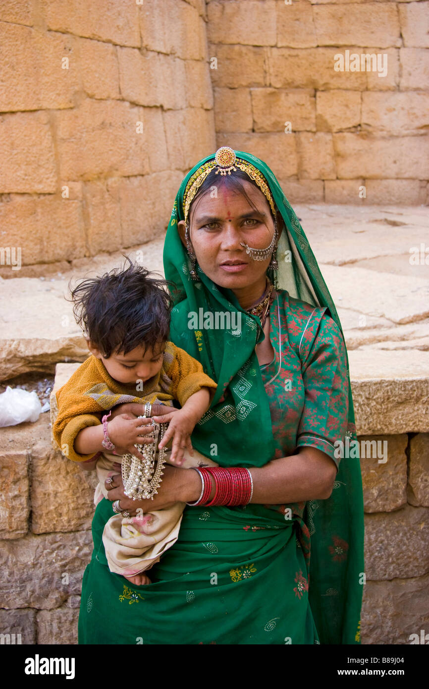 Indian woman mother holds child Jaisalmer Rajasthan India Stock Photo ...