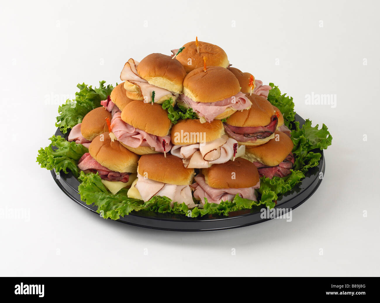 assorted small mini sandwiches deli style party tray Stock Photo - Alamy