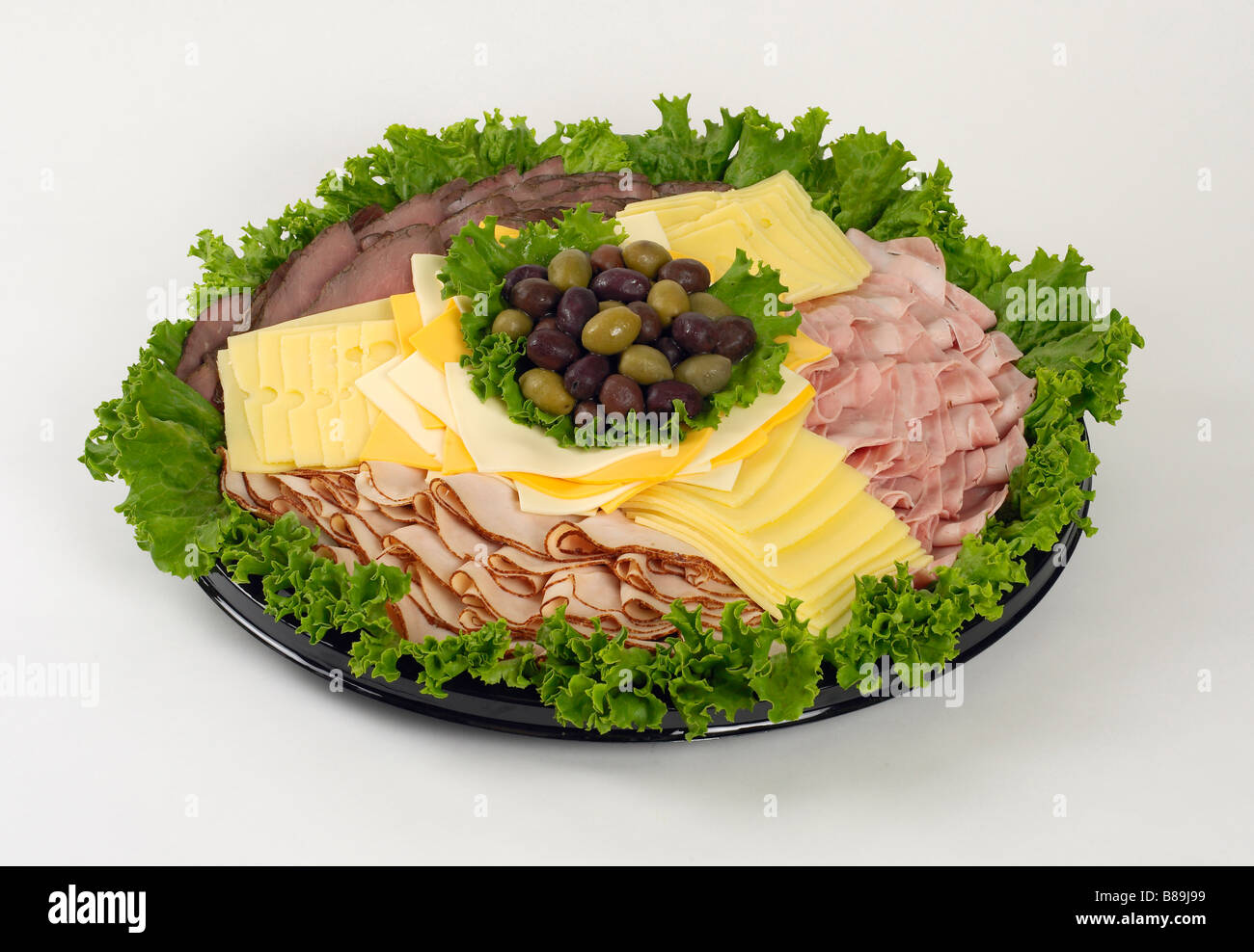 large meat and cheese deli party style tray Stock Photo - Alamy
