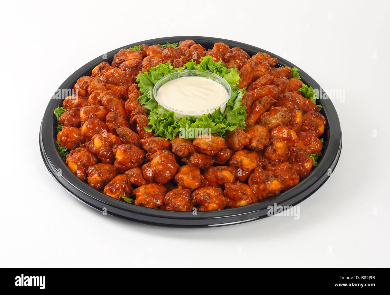large chicken wing deli party tray Stock Photo - Alamy