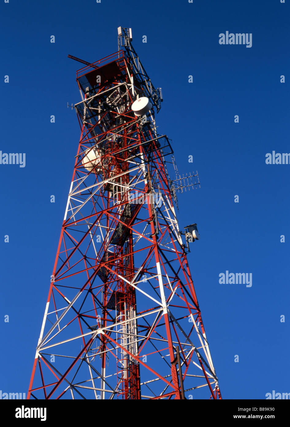Communications Tower with Microwave Dishes and Cellular Antennas Stock ...
