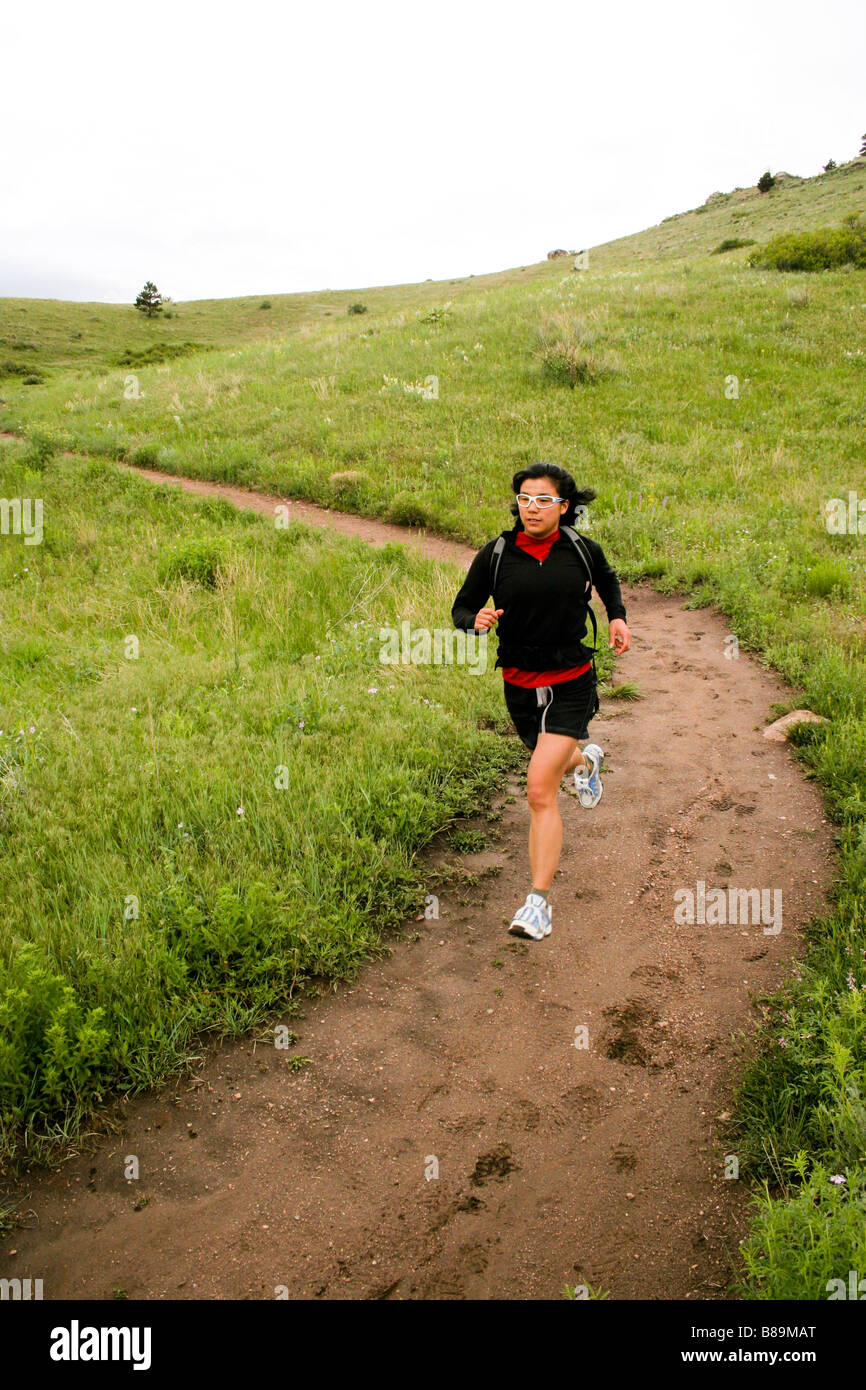 Women trail runs in Horsetooth Mountain Park in Colorado Stock Photo ...