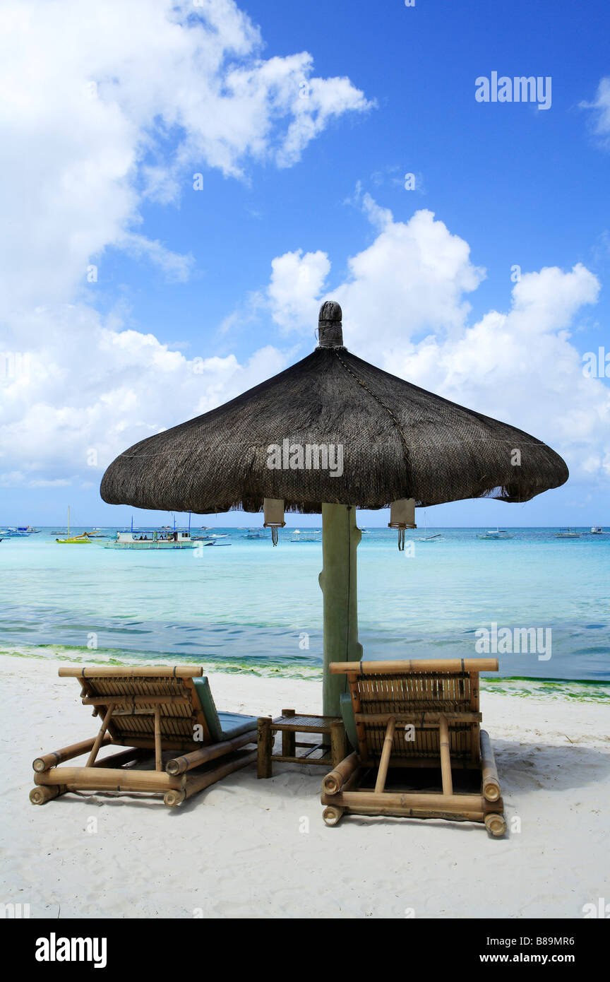 Beach chairs and sunshade on beach Stock Photo - Alamy
