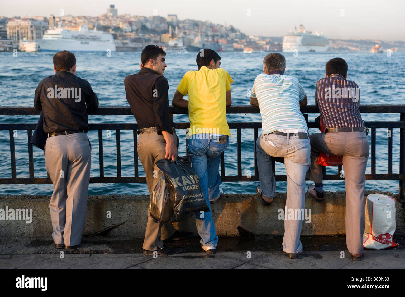 Young Men Harbourside Eminonu Istanbul Turkey Stock Photo - Alamy