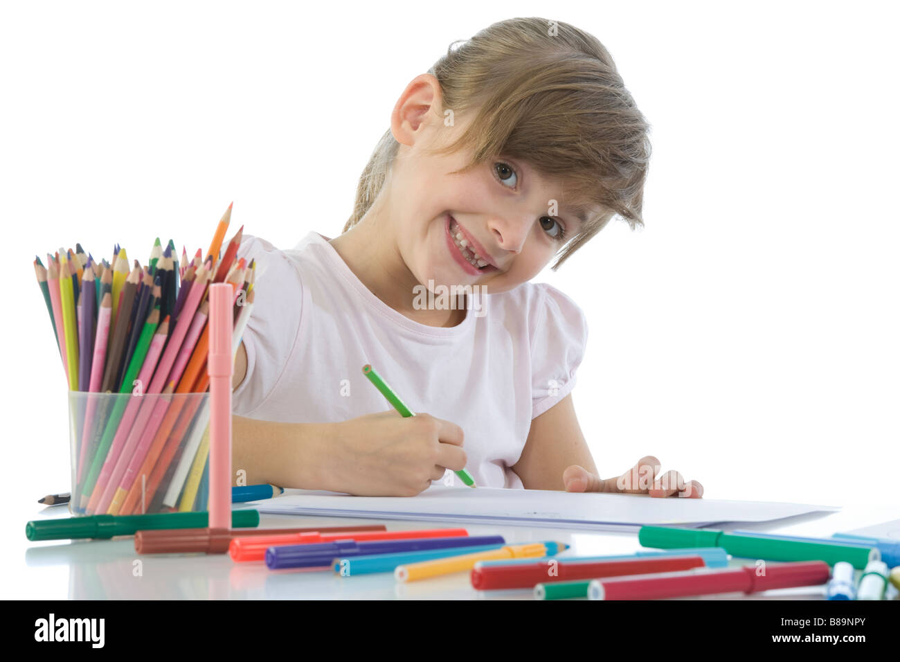 Cute girl school age draws hi-res stock photography and images - Alamy