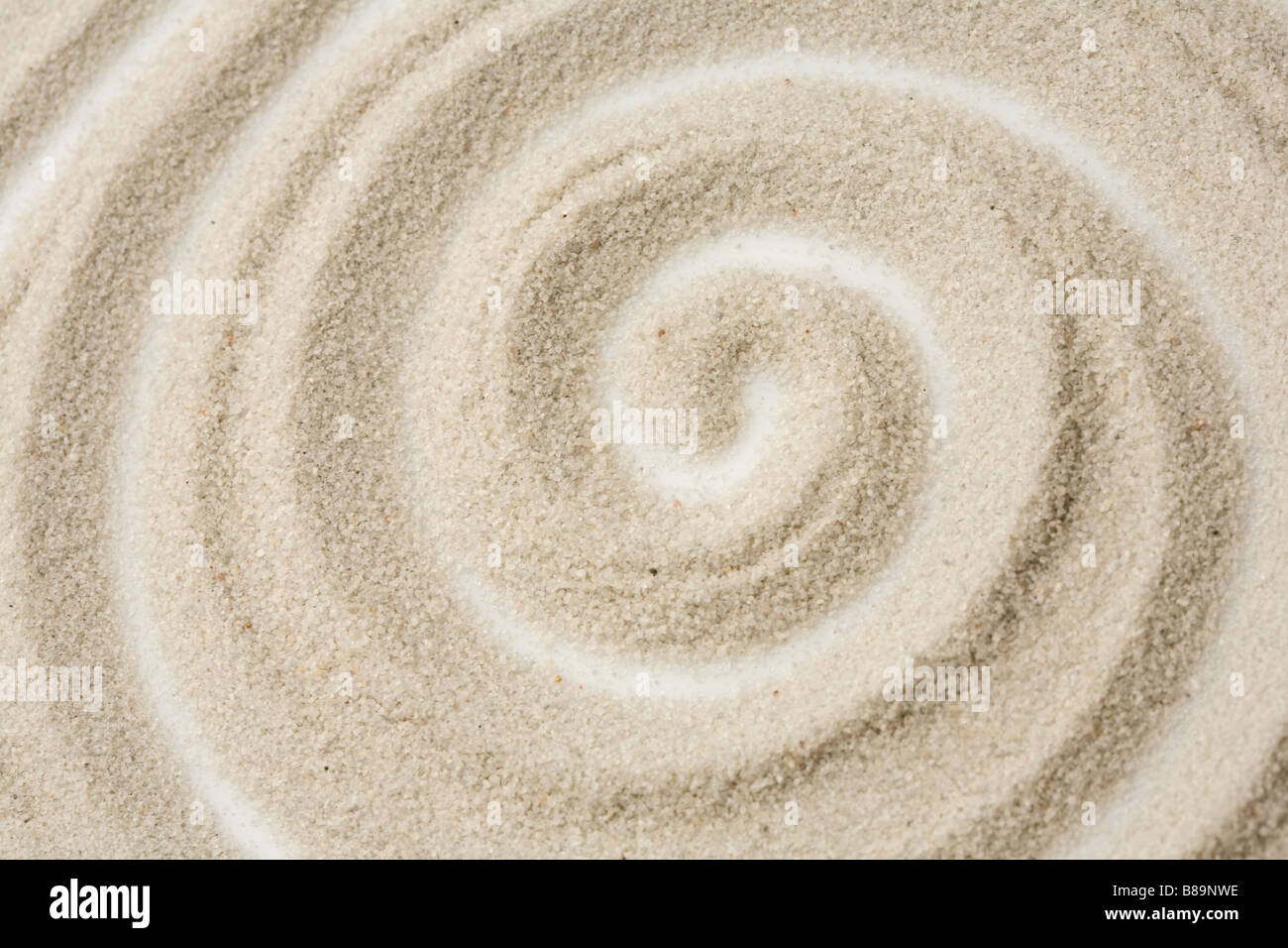 Photo of spiral pattern in the sand Stock Photo - Alamy
