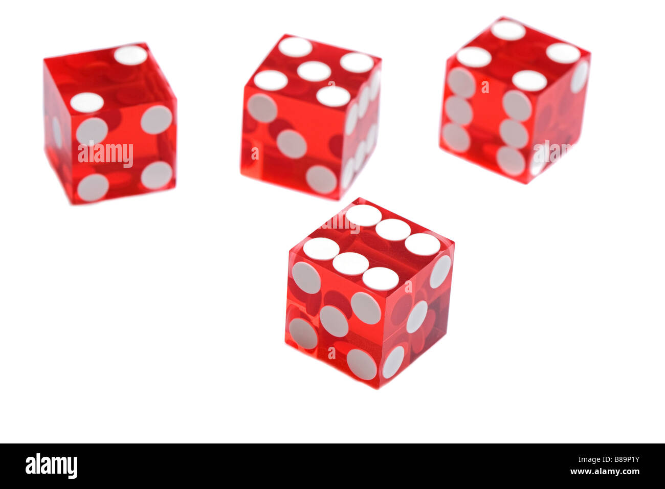 Four red dices on a over white background Stock Photo - Alamy