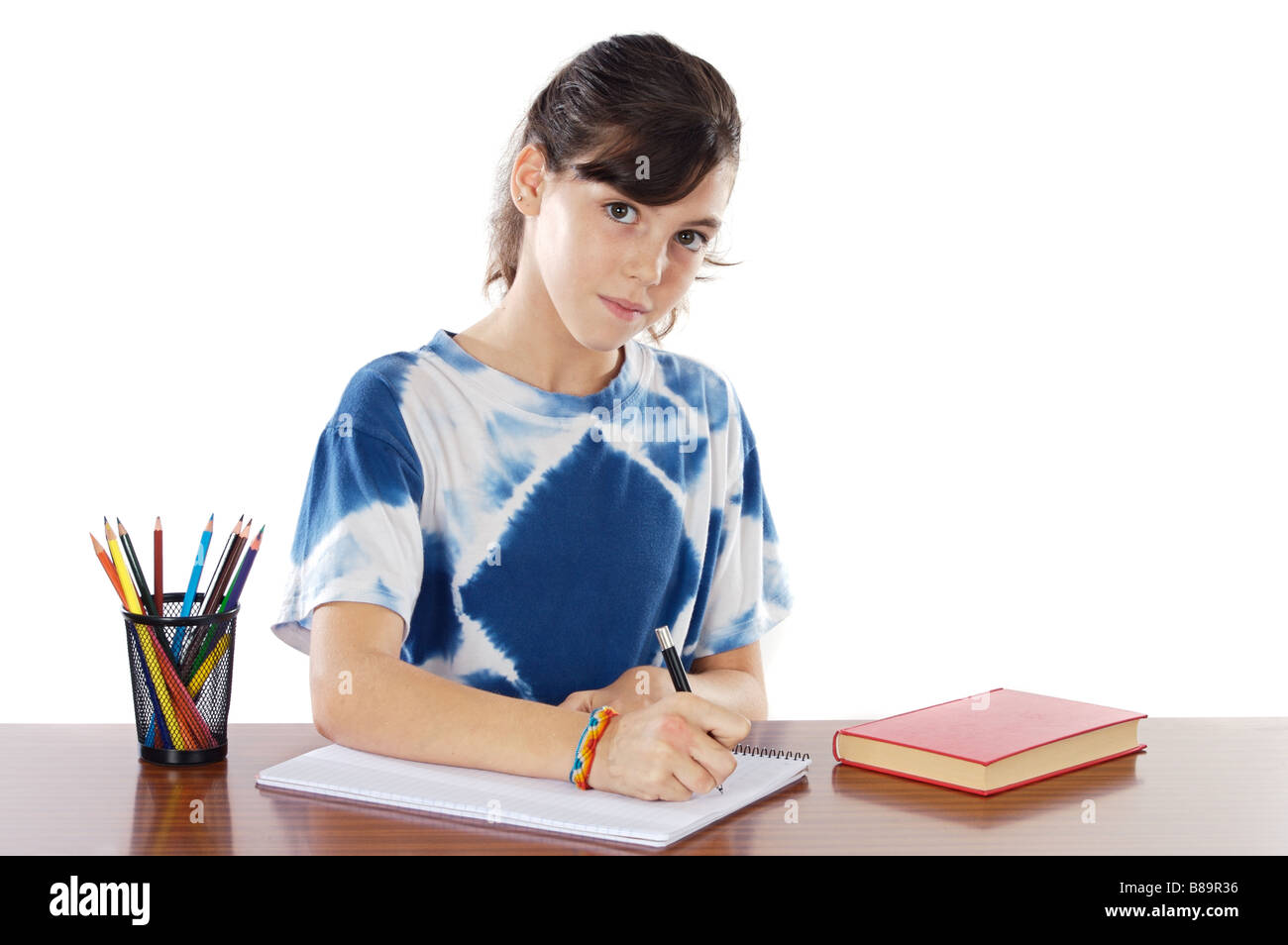 girl studying in the school a over white background Stock Photo - Alamy