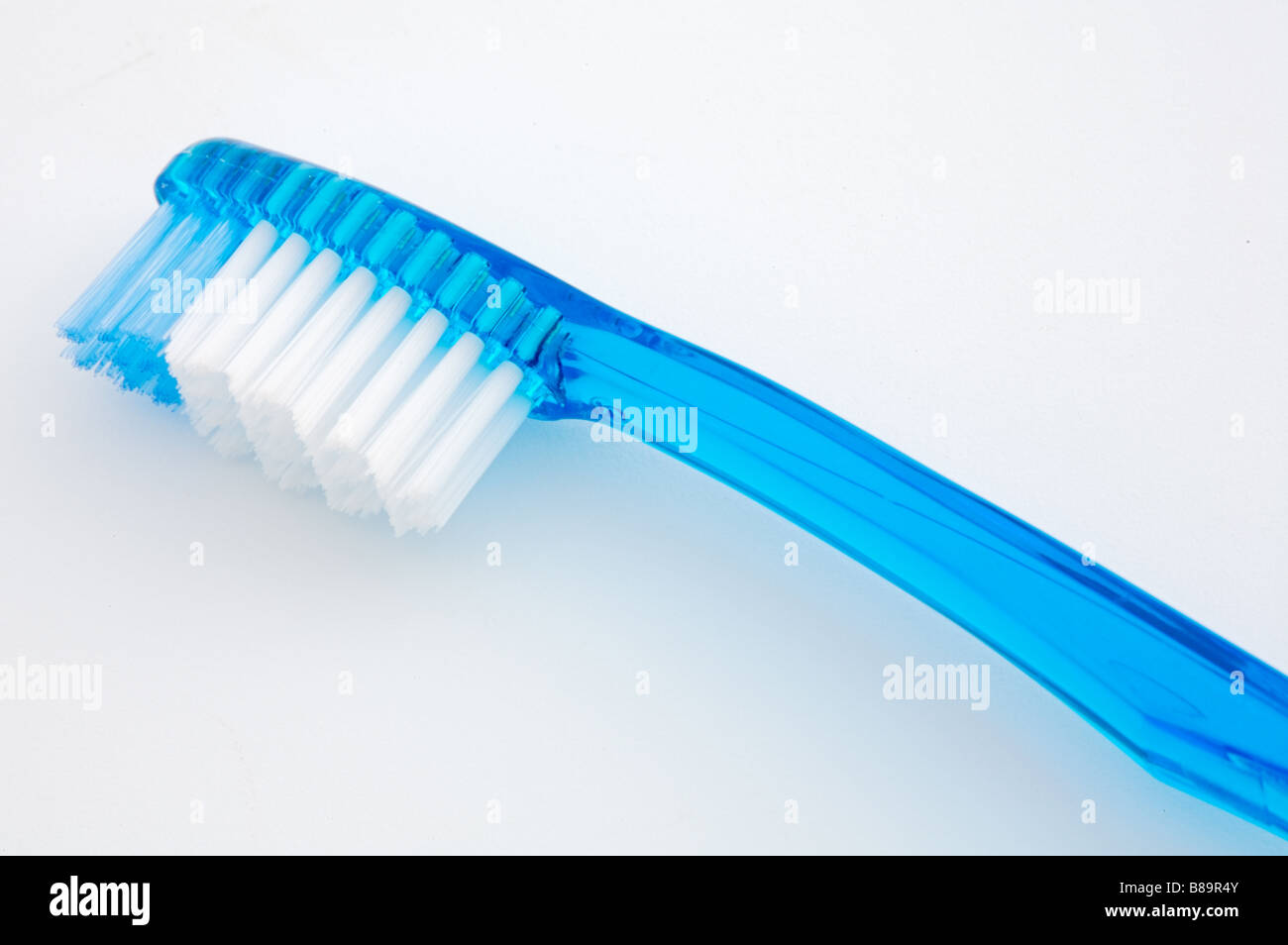 Blue transparent toothbrush hi-res stock photography and images - Alamy