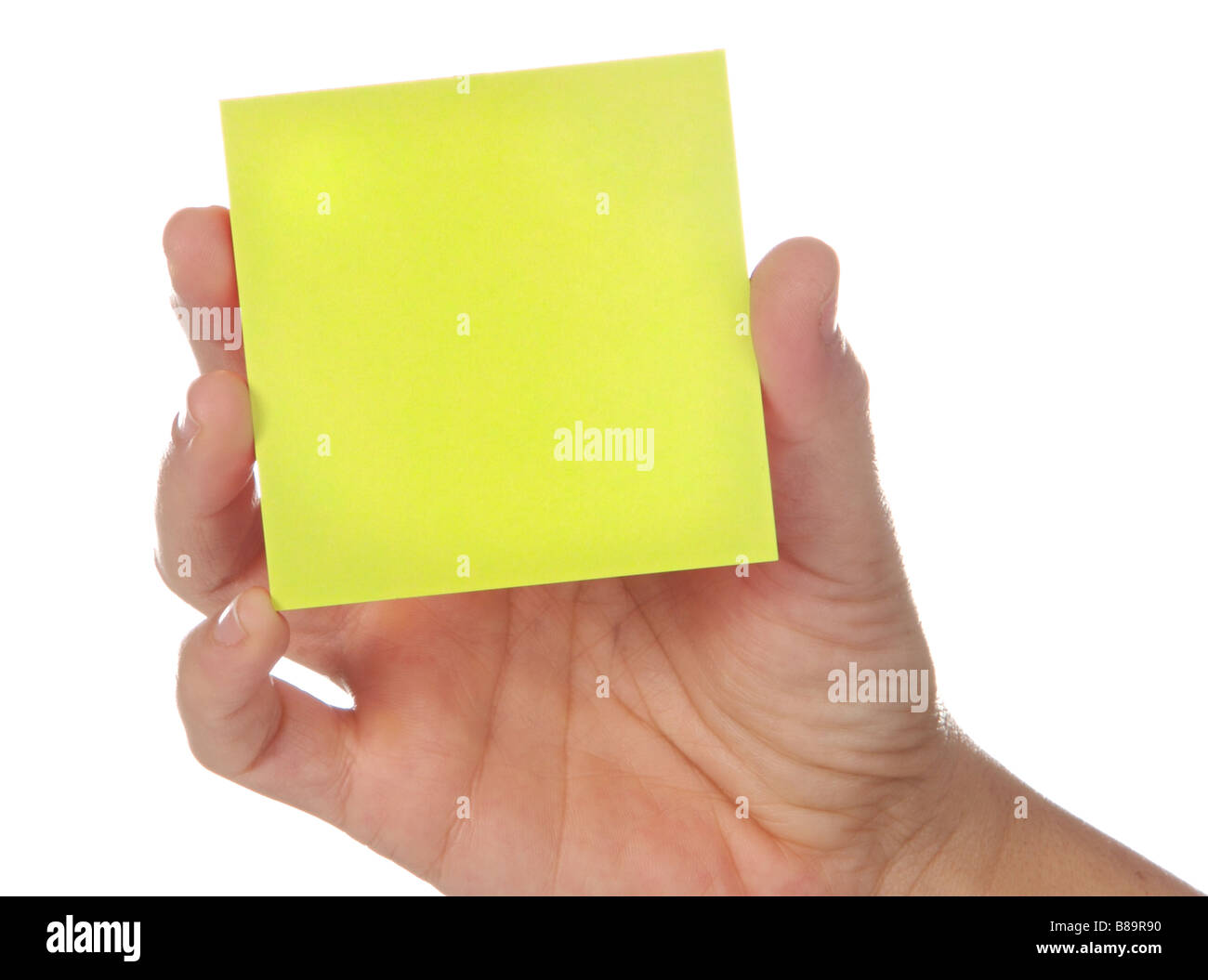 Post It and hand a over white background Stock Photo - Alamy